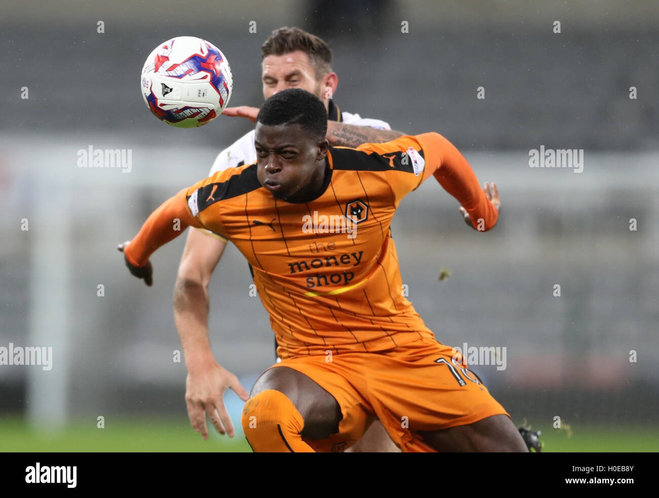 Wolverhampton Wanderers' Dominic Iorfa (front) and Newcastle United's ...