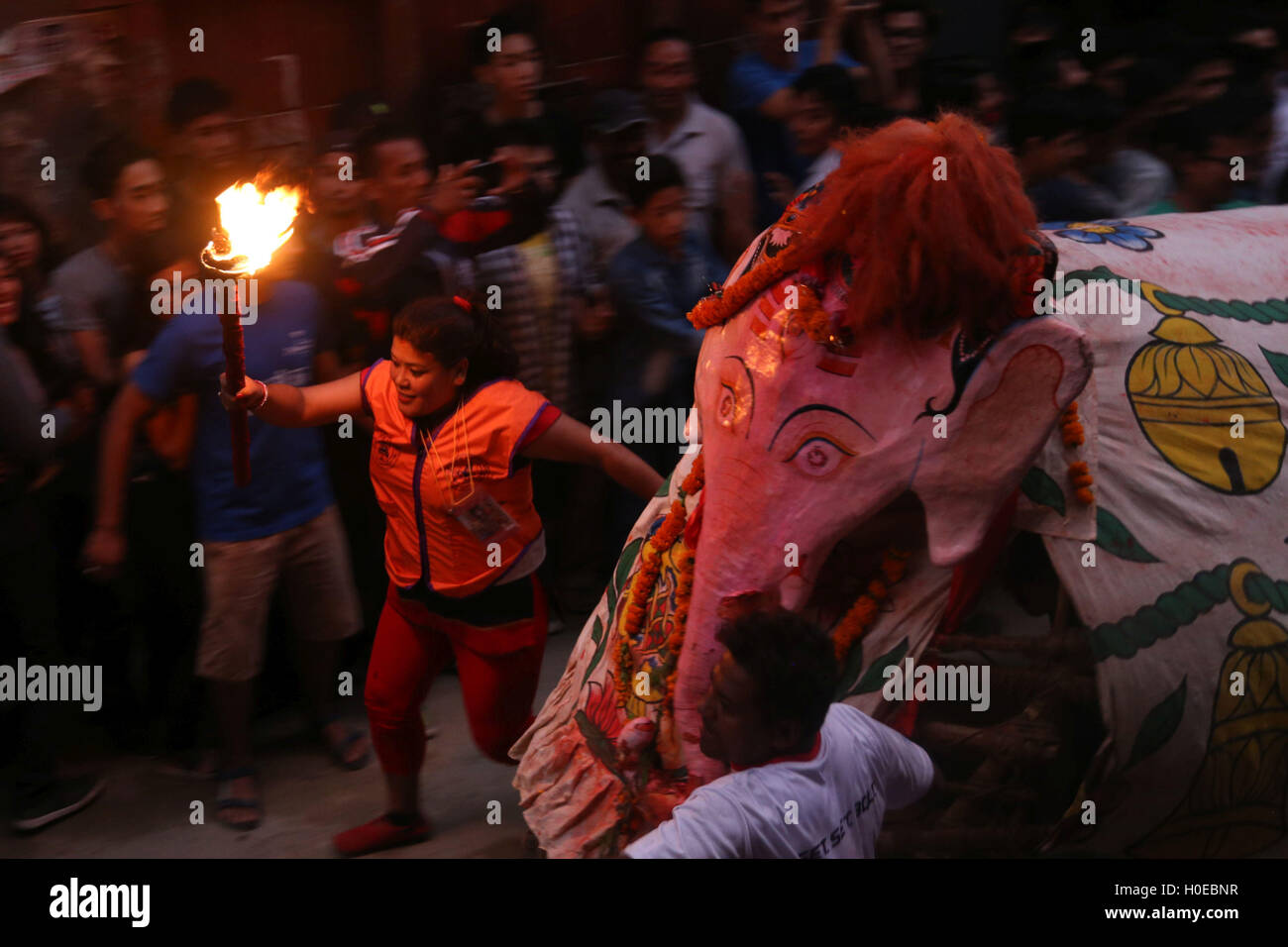Kathmandu, Nepal. 20th Sep, 2016. Masked dancer 'Pulukisi' performs ...