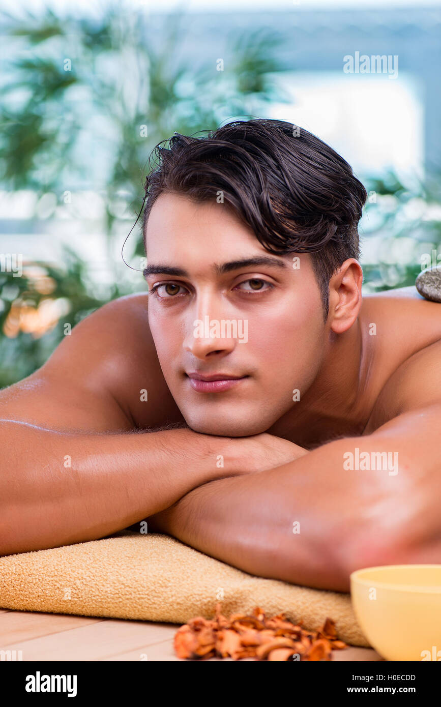 Handsome man during spa session Stock Photo - Alamy