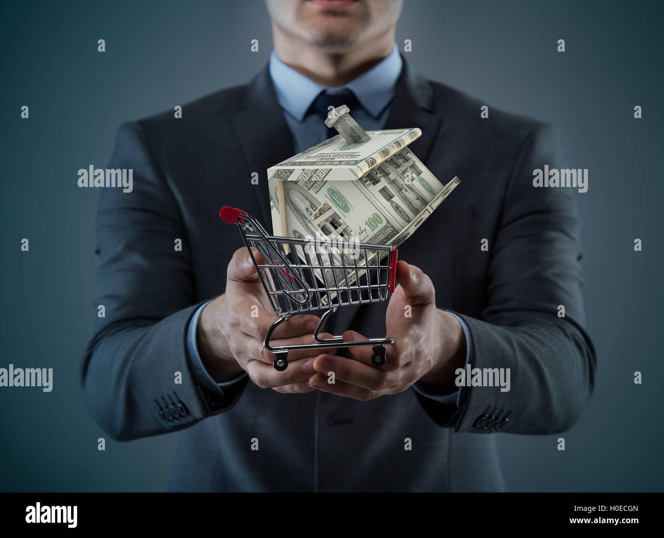 Man in house purchase mortgage concept Stock Photo - Alamy
