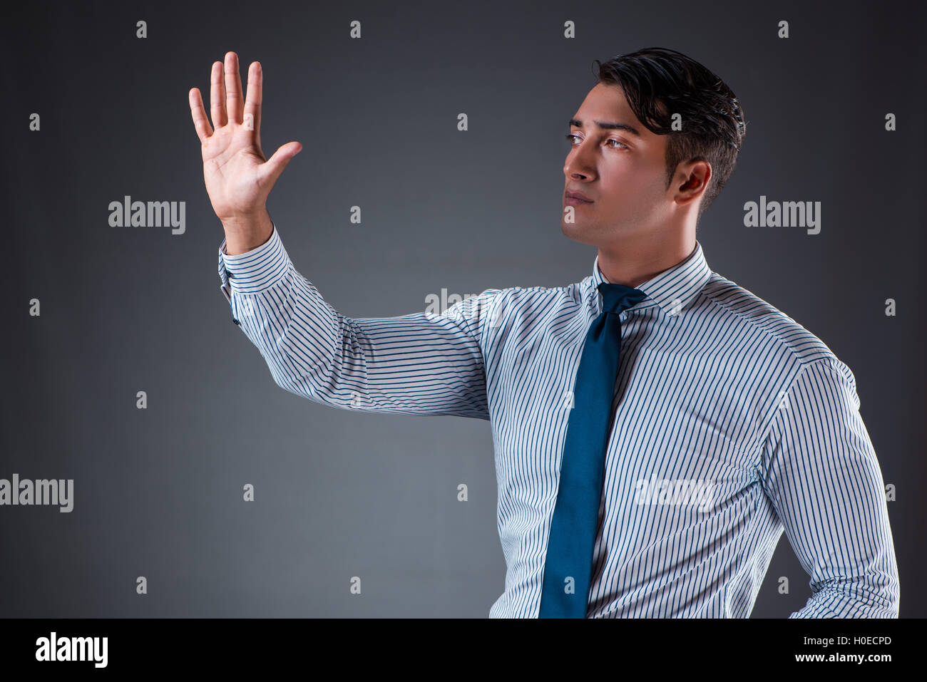 Handsome businessman pressing virtual buttons Stock Photo - Alamy Handsome businessman pressing virtual buttons Stock Photo - Alamy