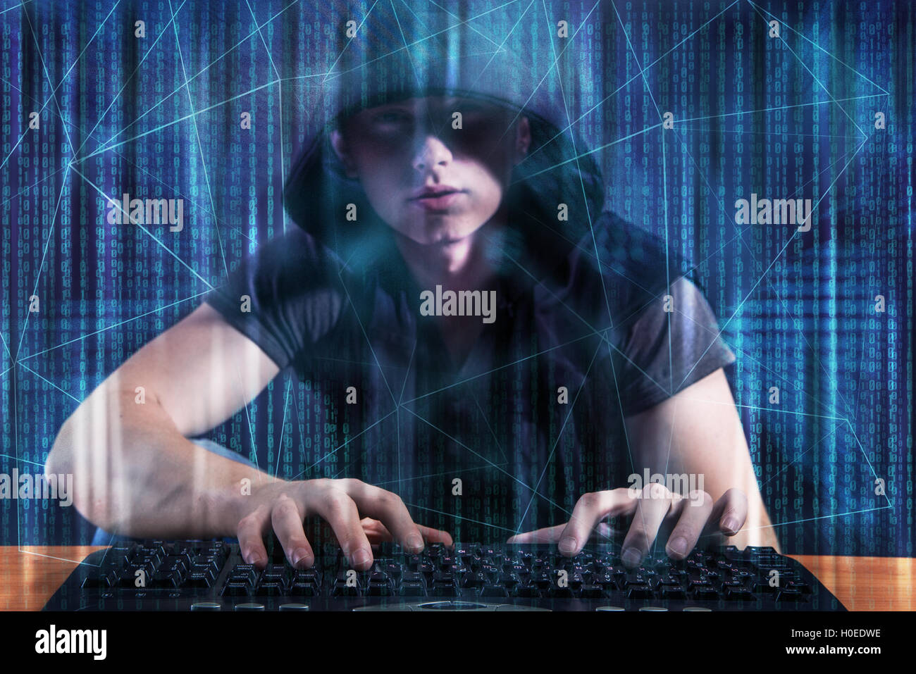 Young hacker in digital security concept Stock Photo - Alamy