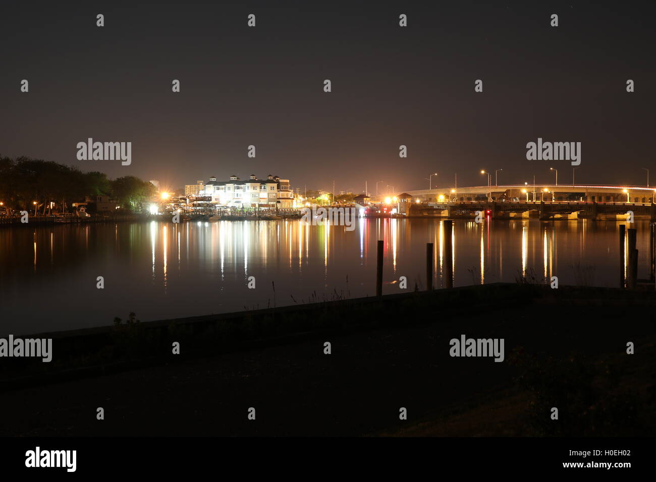 Reflection water lights night sky hi-res stock photography and images ...