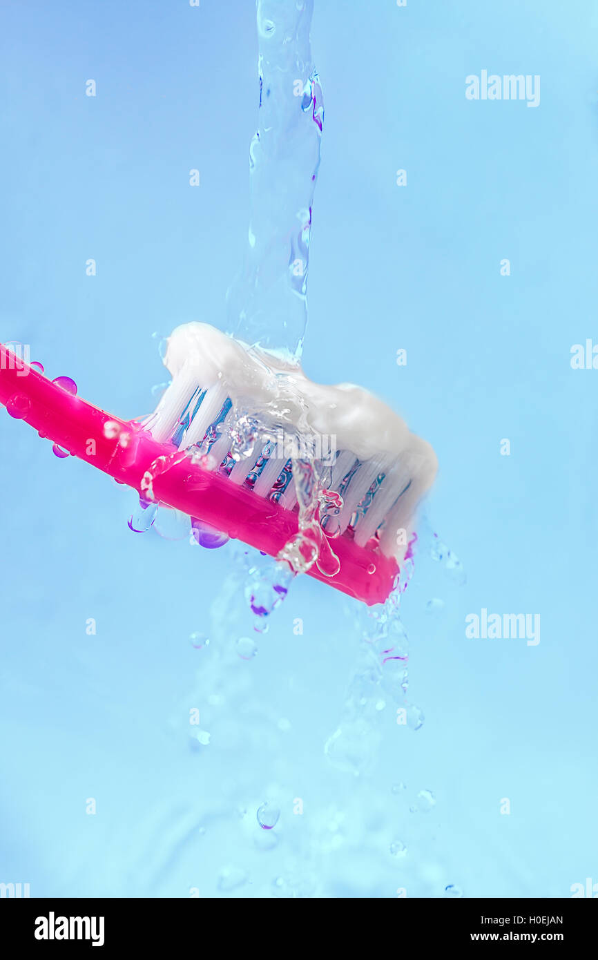 Toothbrush with water jet Stock Photo - Alamy