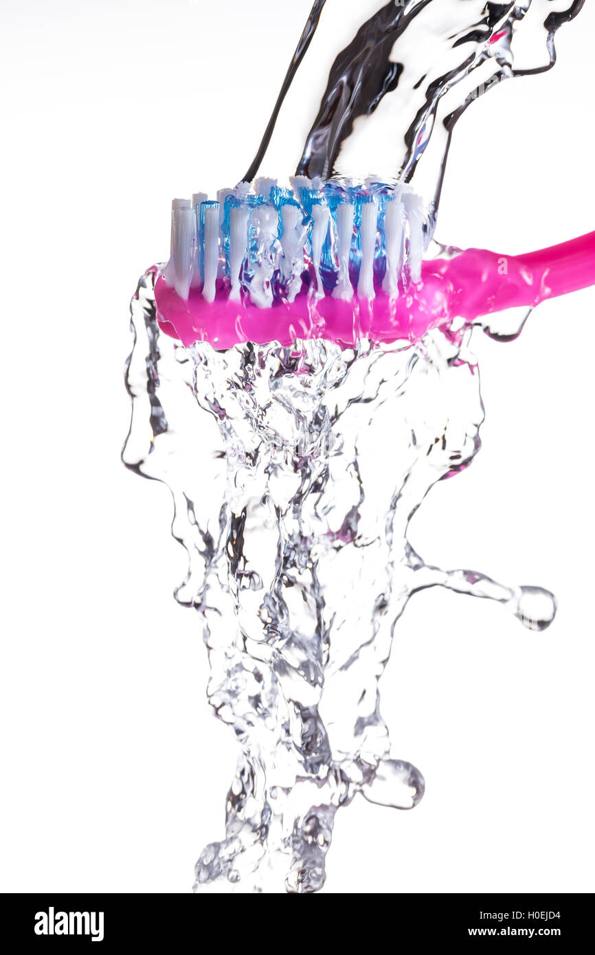 Toothbrush with water jet Stock Photo - Alamy