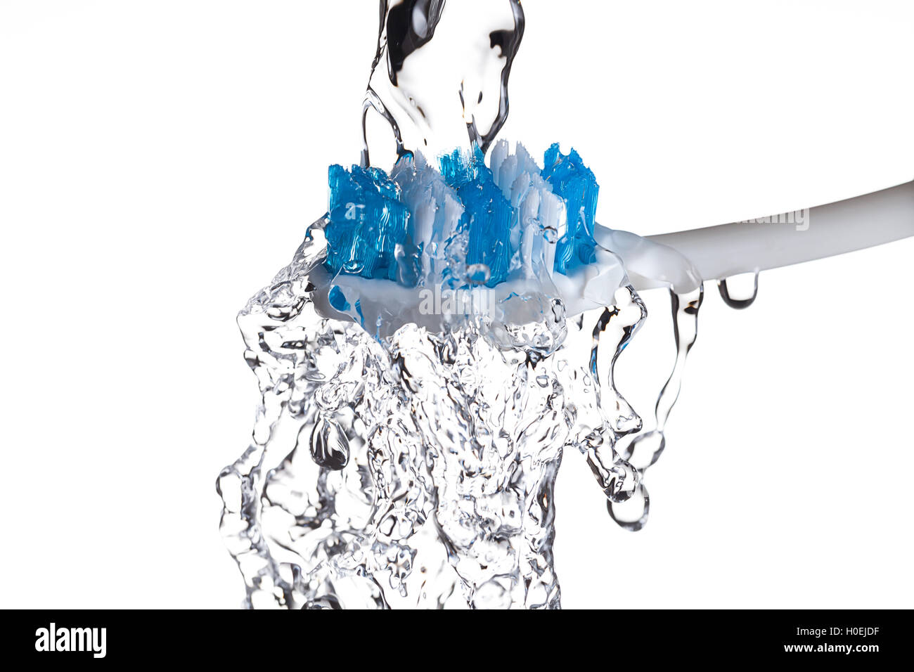 Toothbrush with water jet Stock Photo - Alamy