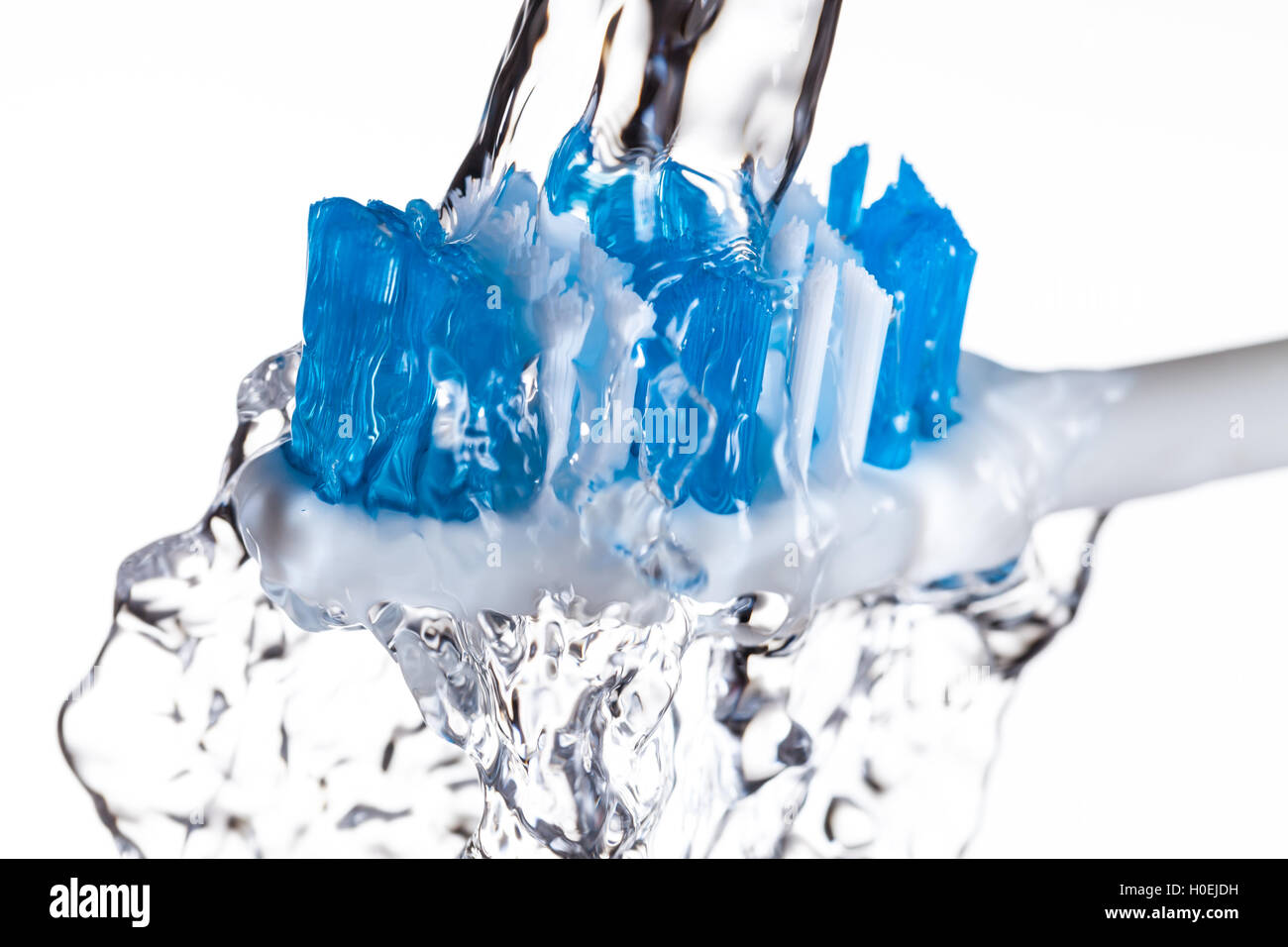 Toothbrush with water jet Stock Photo - Alamy