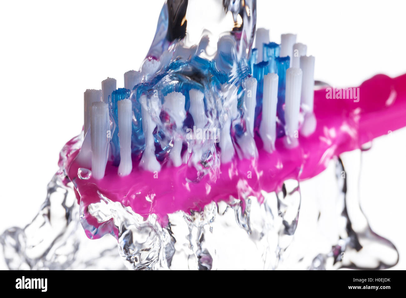 Toothbrush with water jet Stock Photo - Alamy