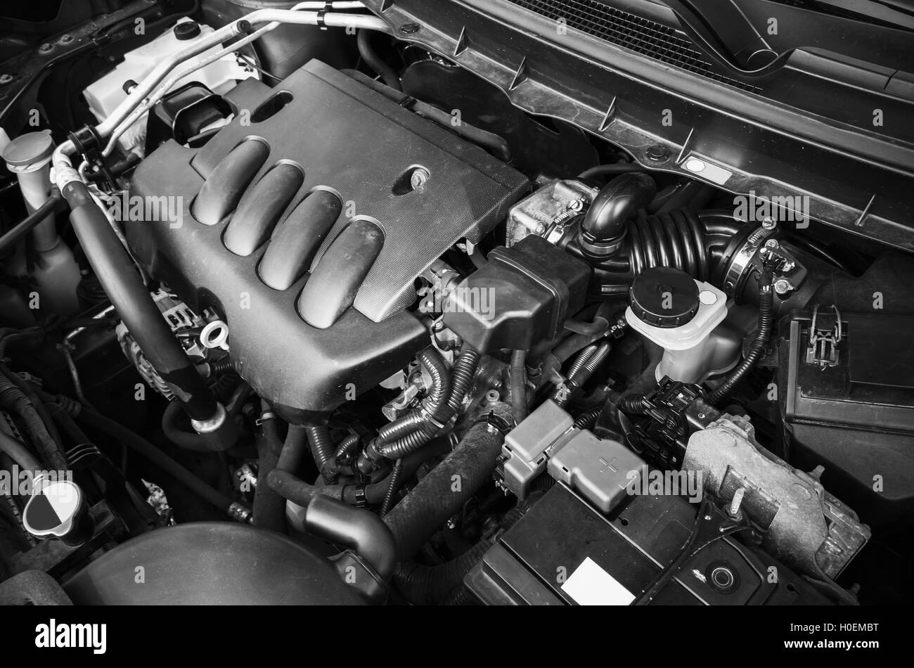 Modern suv car undersquare engine under oped hood, black and white ...