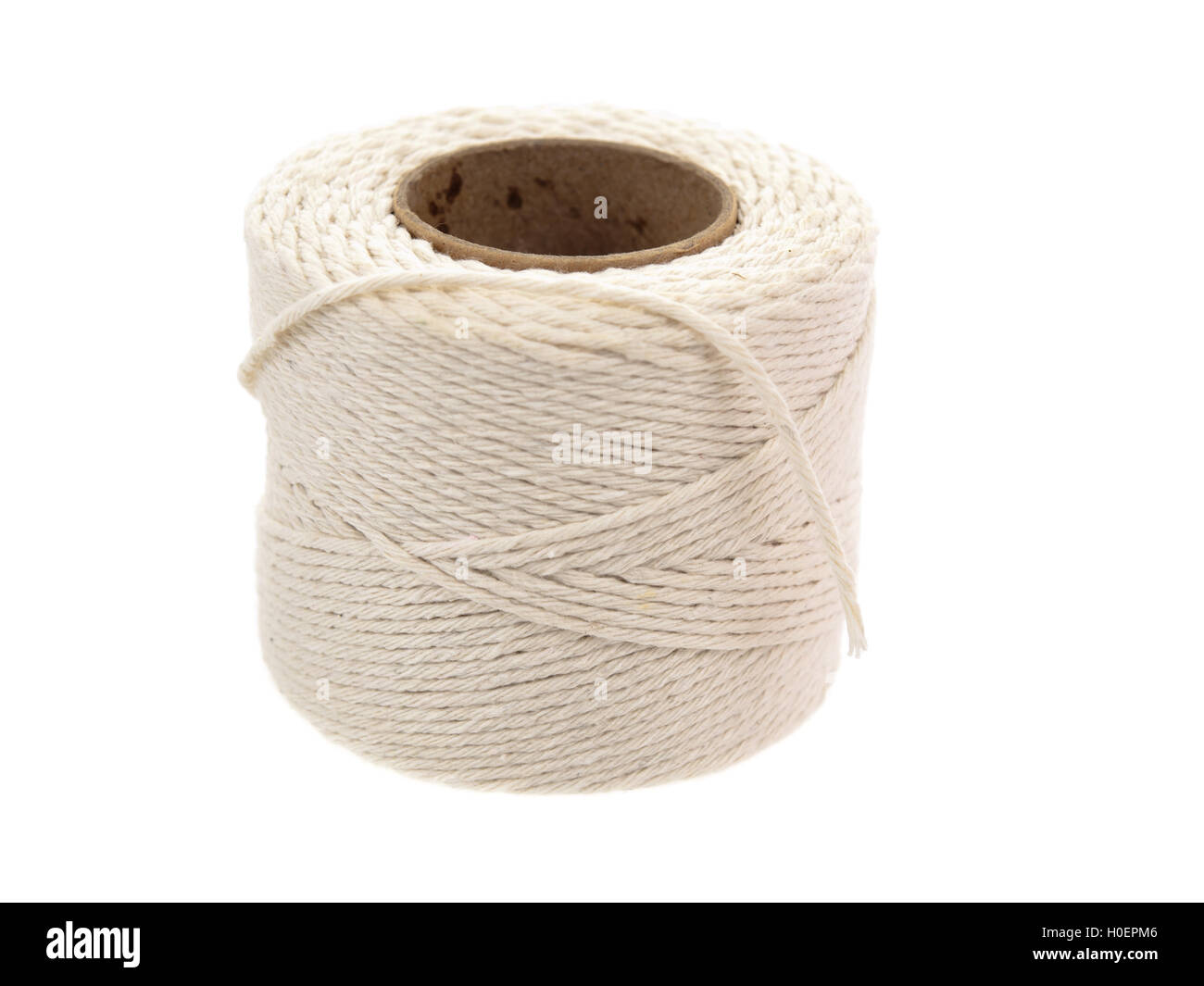 Roll of hemp string isolated on white Stock Photo - Alamy