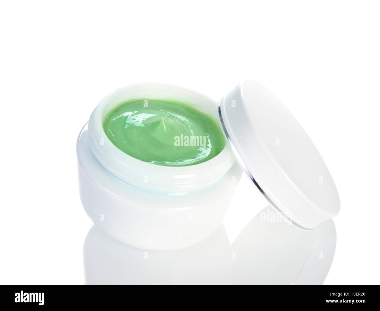 Pot of moisturizing face cream on white background Stock Photo - Alamy