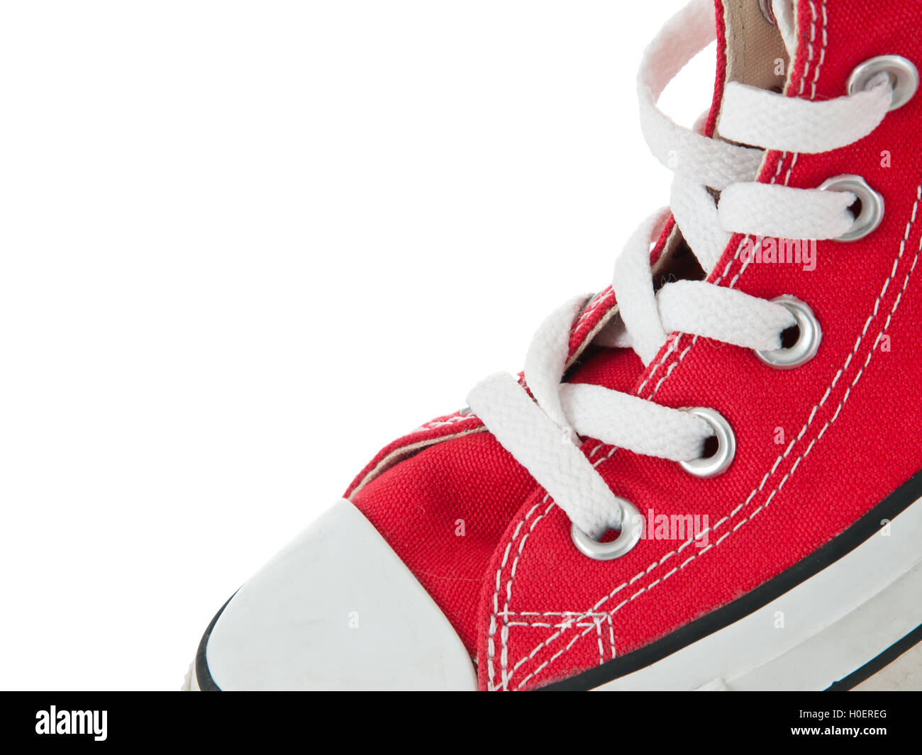 Vintage hanging red shoes on pure white background Stock Photo - Alamy