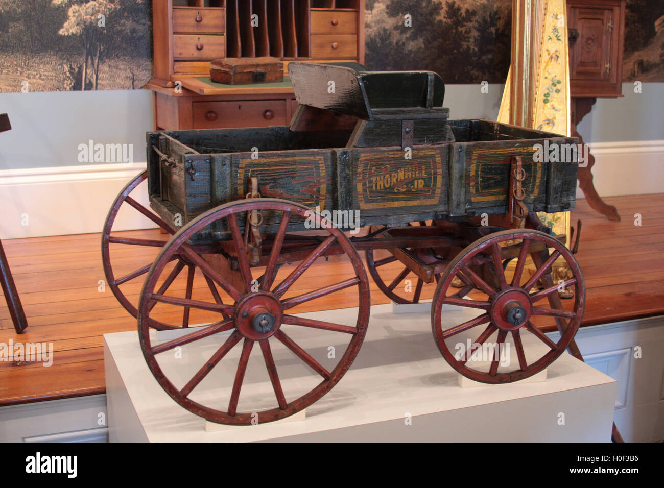 Small replica of old style wagon displayed in museum Stock Photo - Alamy