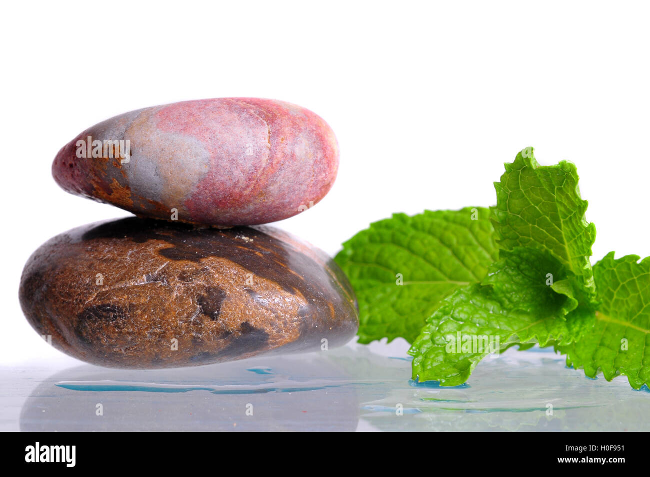 Zen Stones and Mint Stock Photo - Alamy