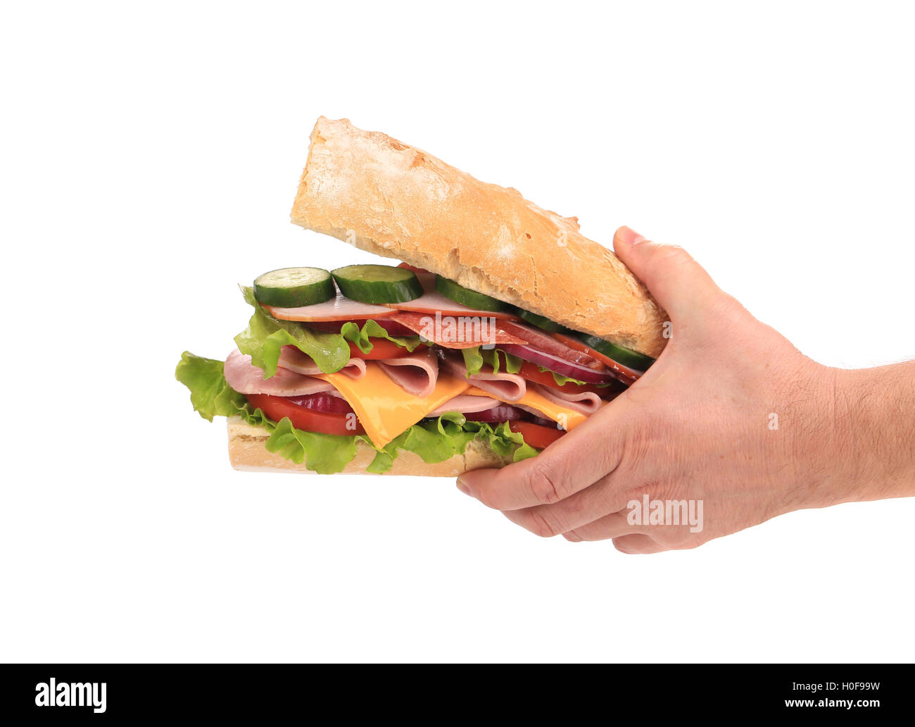 Sub sandwich in hand Cut Out Stock Images & Pictures - Alamy