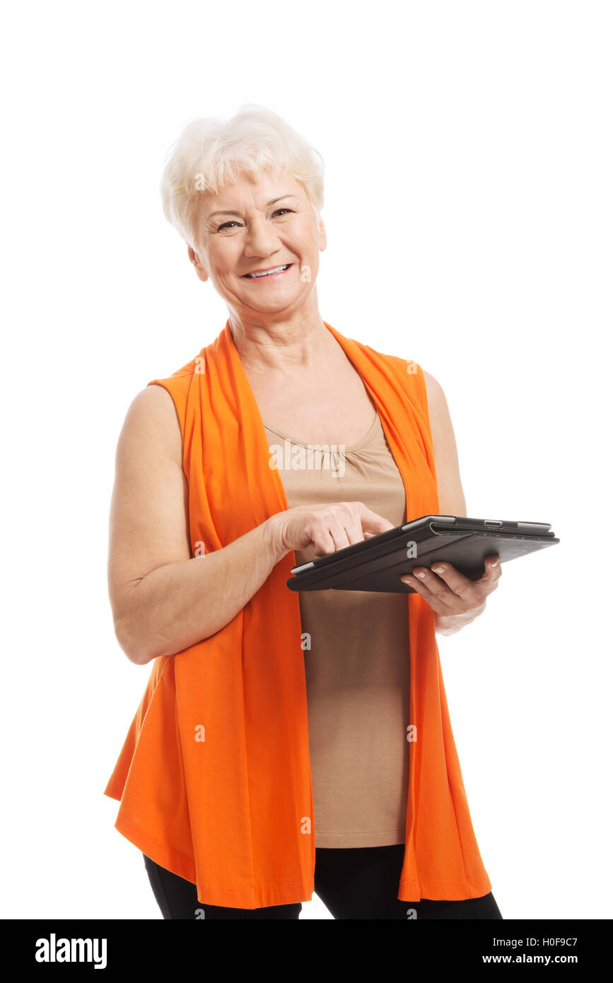 An old lady with tablet Stock Photo - Alamy