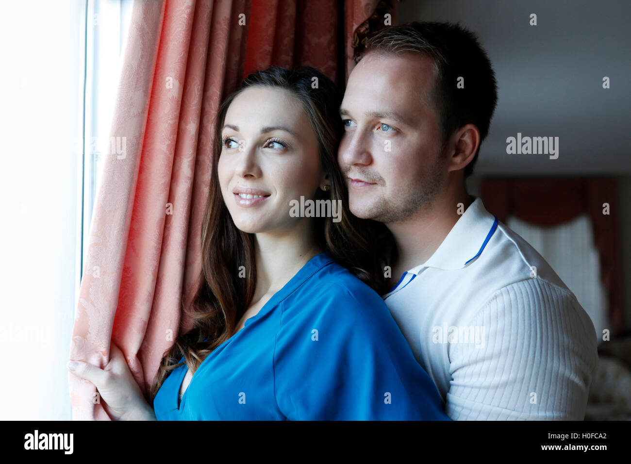 Happy beautiful pair Stock Photo - Alamy