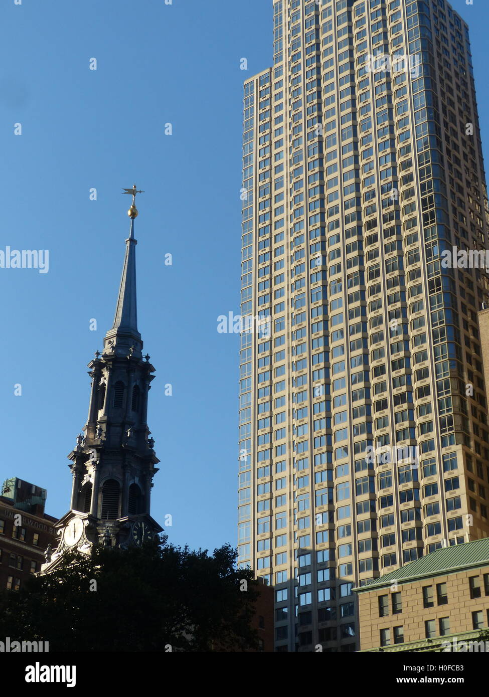 New YORK CITY, church tower with residential high-rises Stock Photo - Alamy
