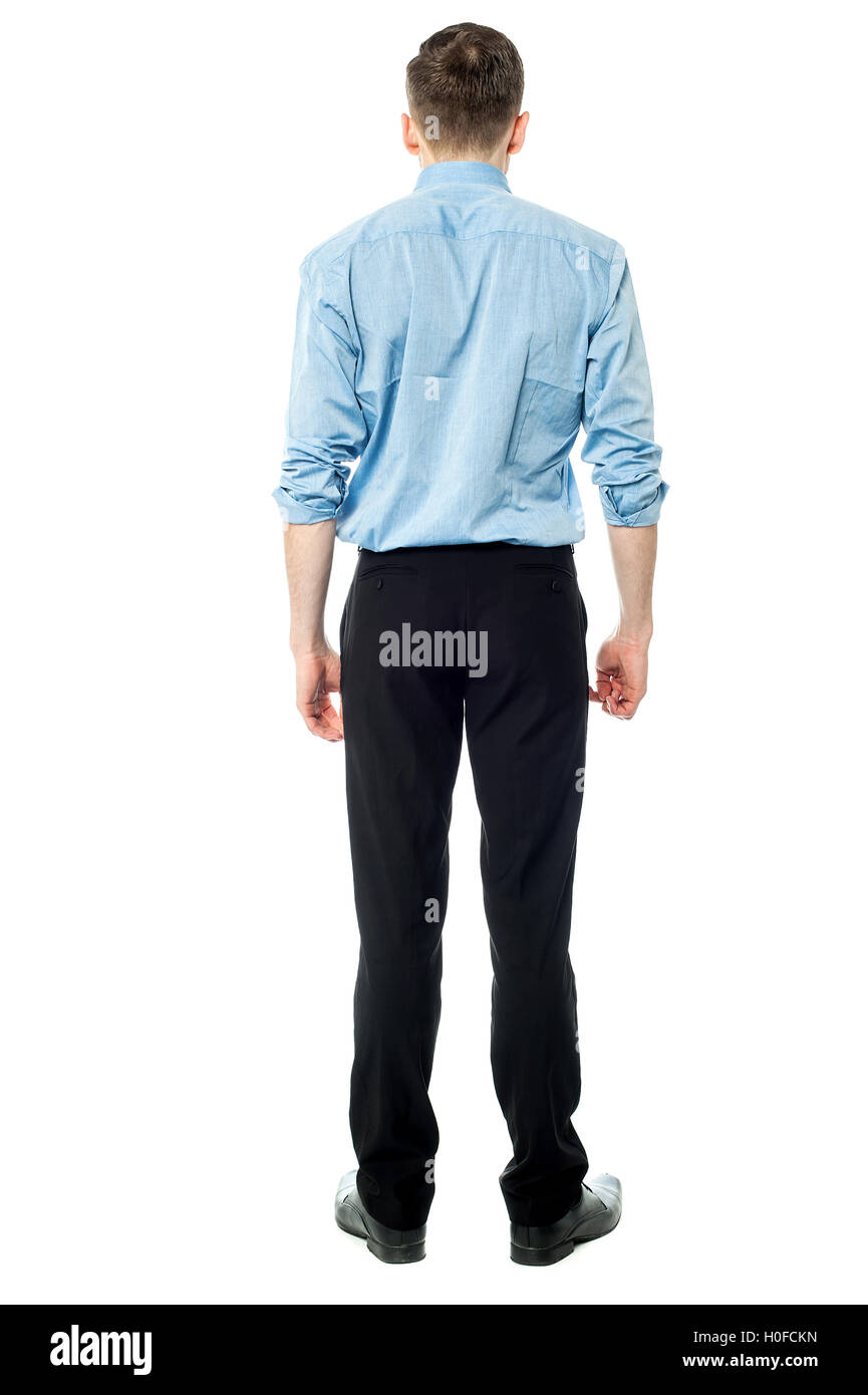 Young man standing facing Cut Out Stock Images & Pictures - Alamy