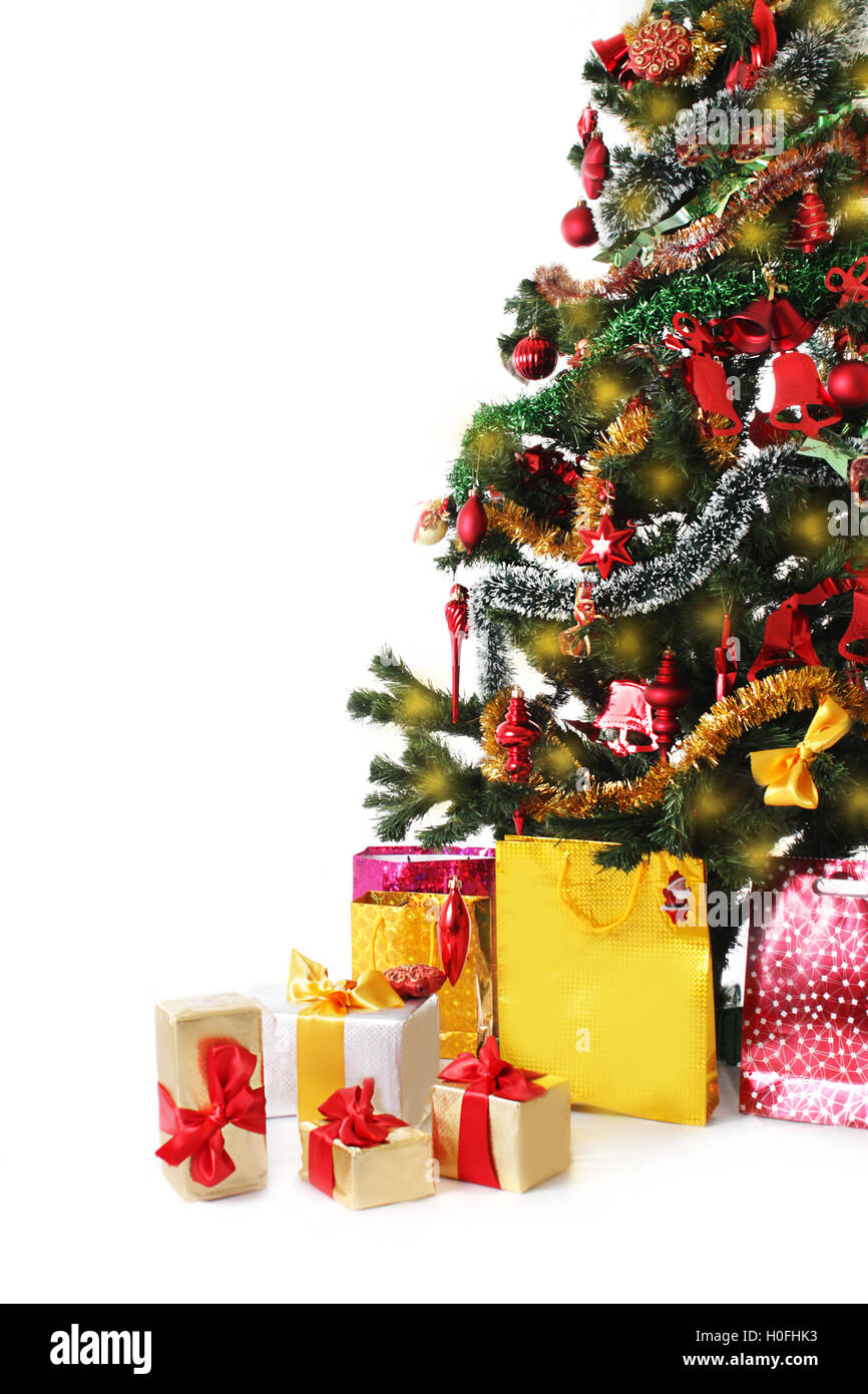 Part of Christmas tree with gifts Stock Photo - Alamy
