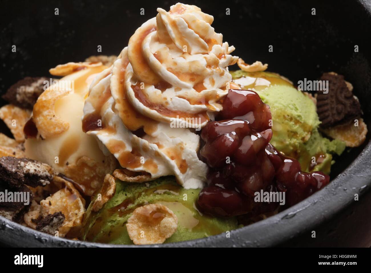 Matcha Stone parfait dessert with chocolate and cream Stock Photo - Alamy