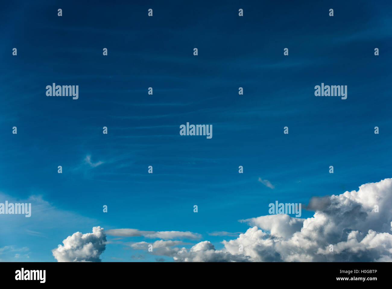 Blue sky with different types of cloud formations Stock Photo - Alamy