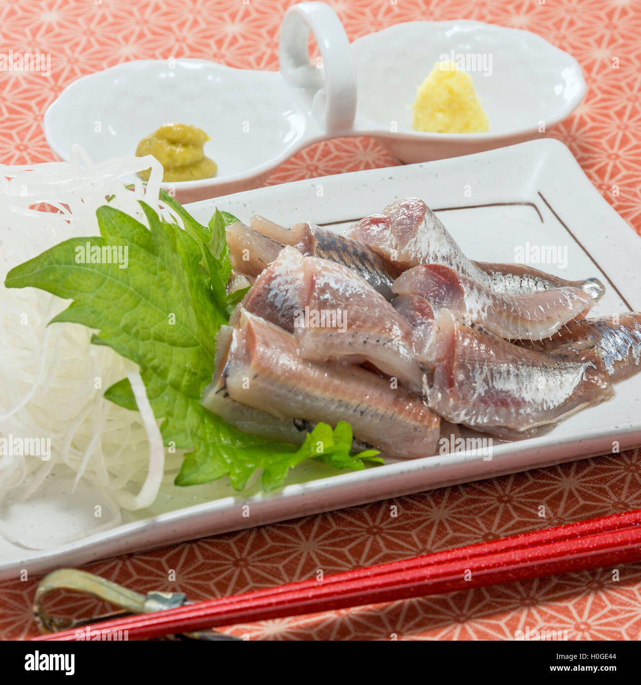 Fresh raw sardine fish fillet with herbs and wasabi Stock Photo - Alamy