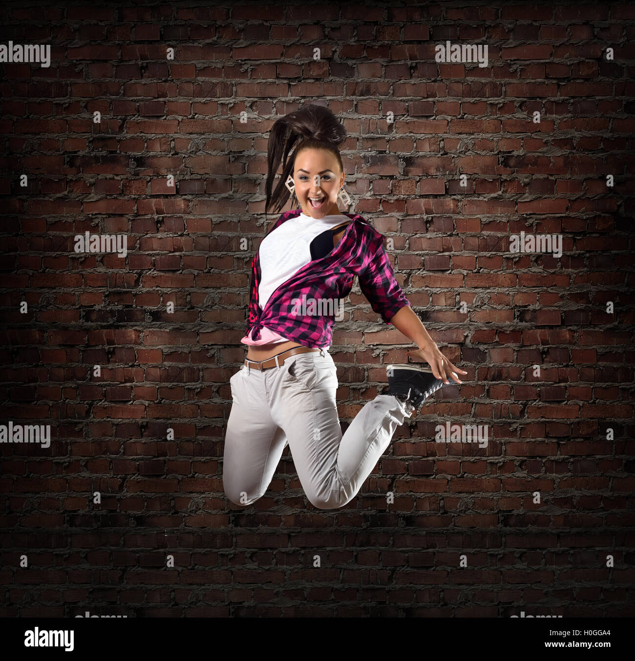 young female dancer jumping Stock Photo - Alamy