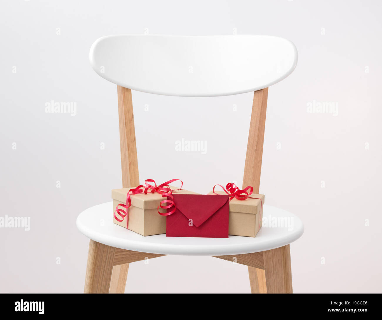 Box present on a chair hi-res stock photography and images - Alamy