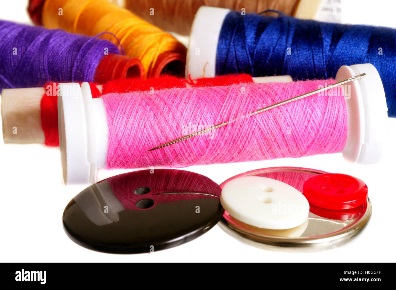 Silver sewing buttons hi-res stock photography and images - Alamy