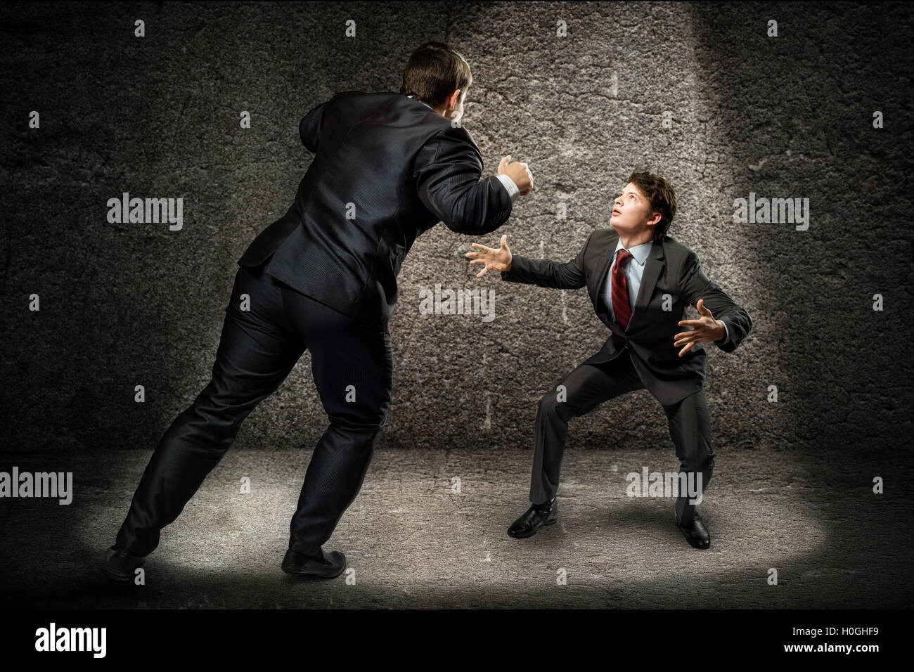 Two businessmen fighting hi-res stock photography and images - Alamy