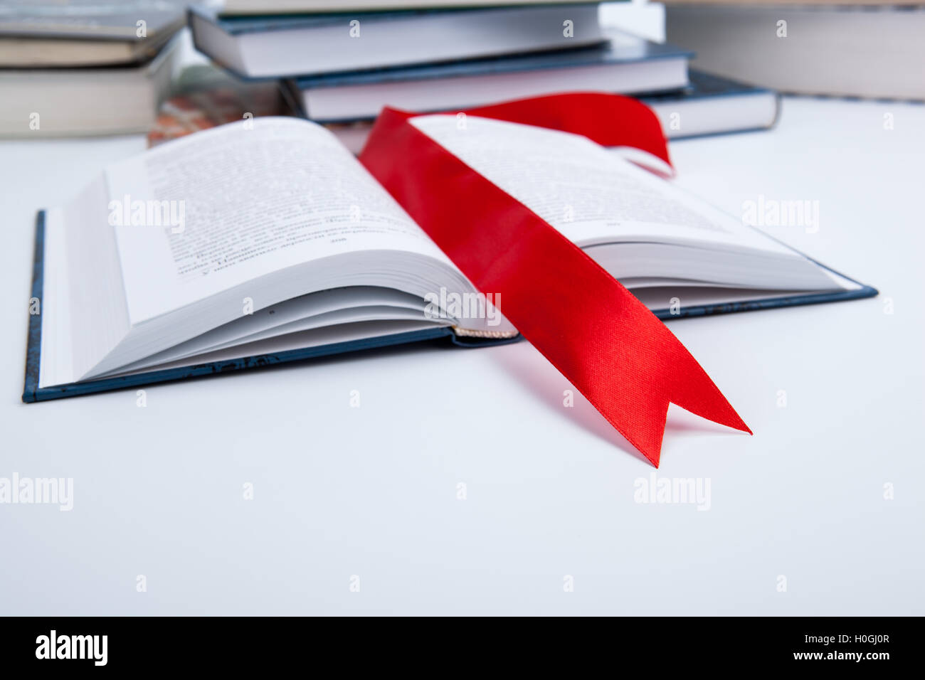 open book whith red bookmark Stock Photo - Alamy