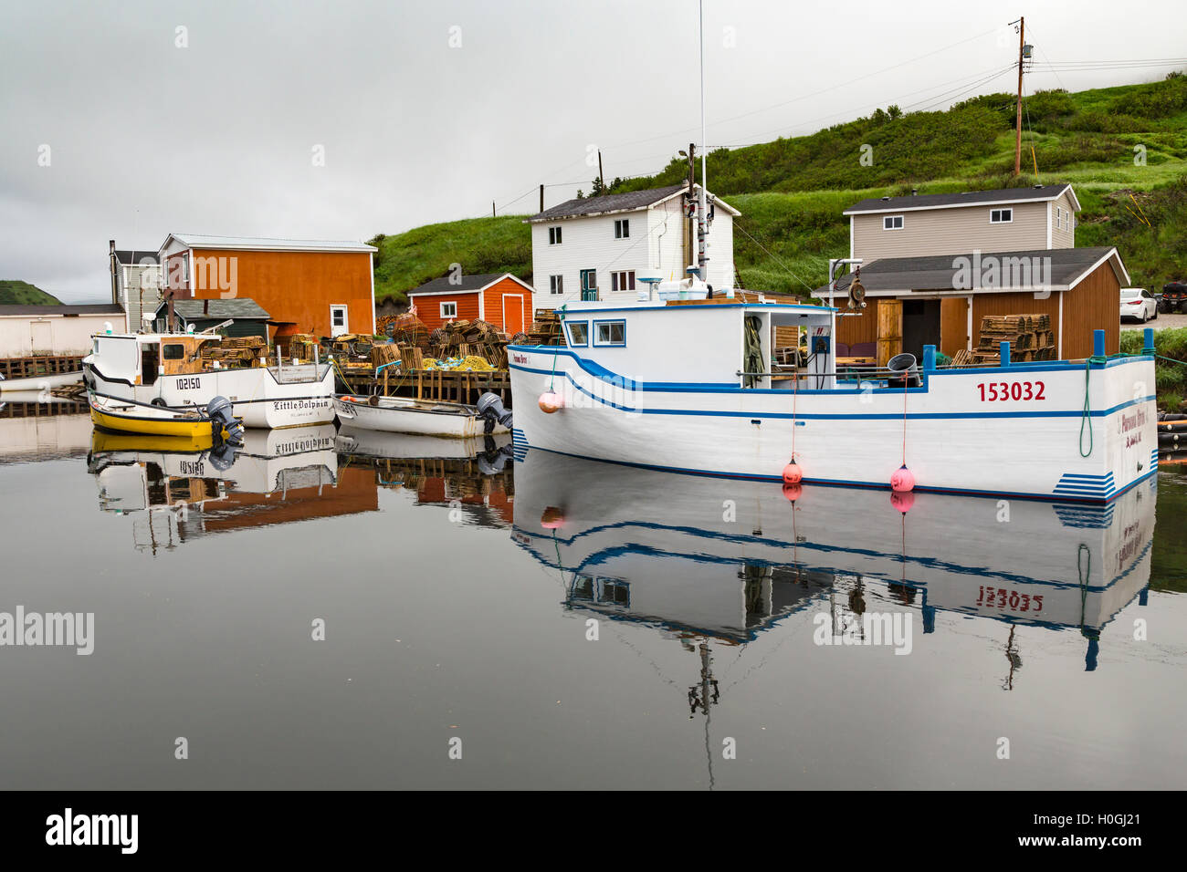 The fishing village and harbour with fishing stages and fishing boats ...