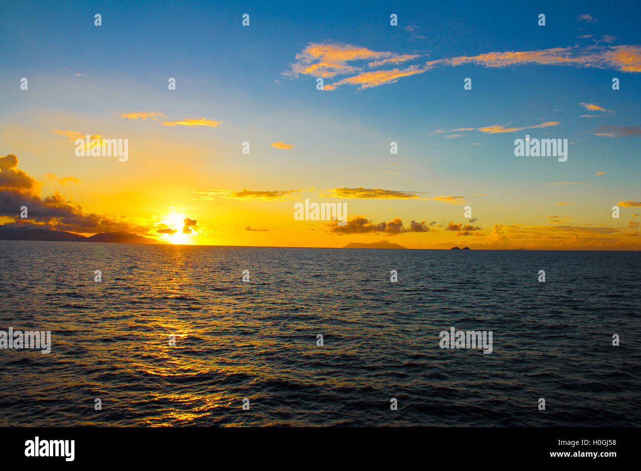 Amazing colorful sunset in Seychelles Stock Photo - Alamy