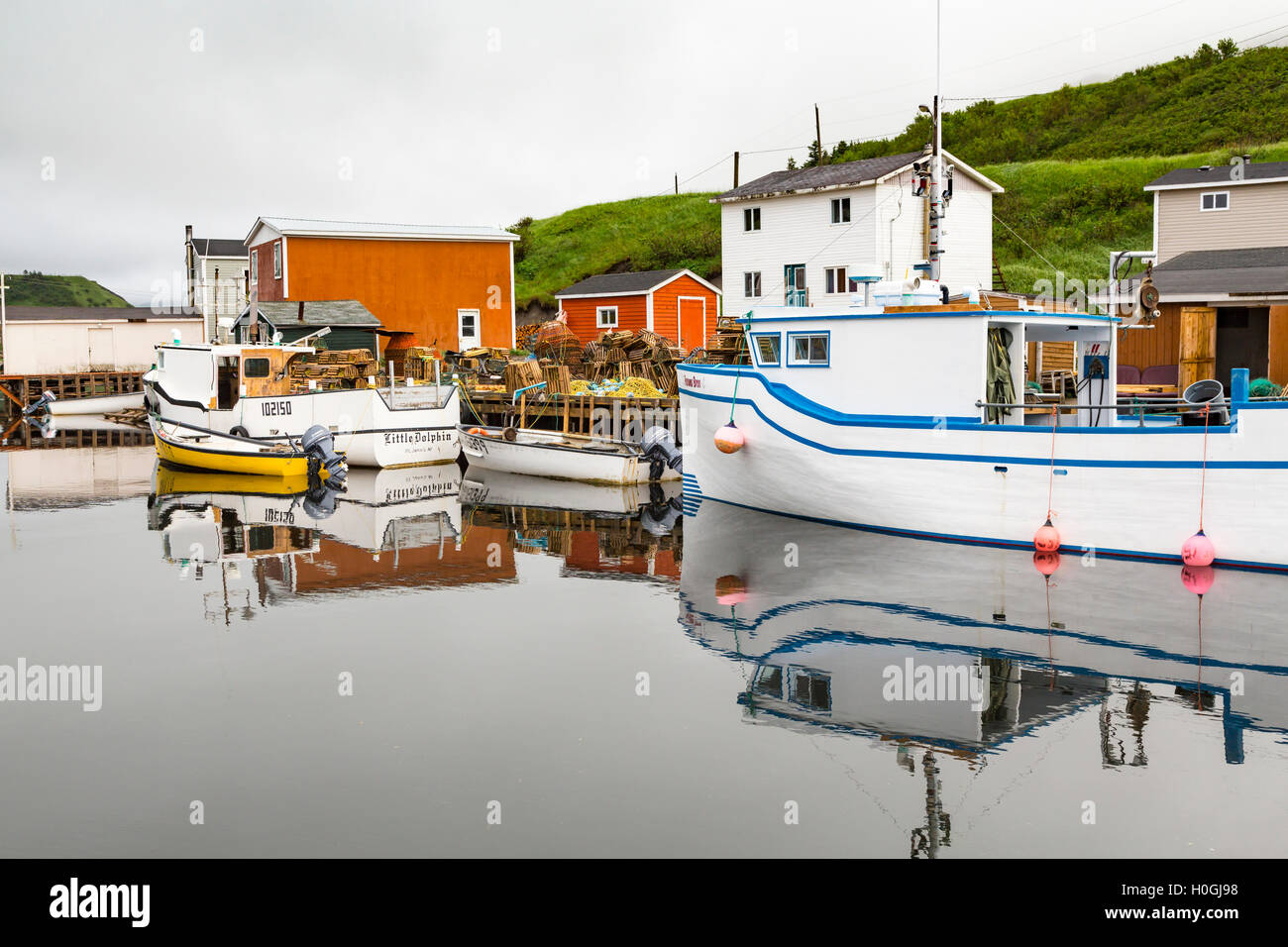 The fishing village and harbour with fishing stages and fishing boats ...