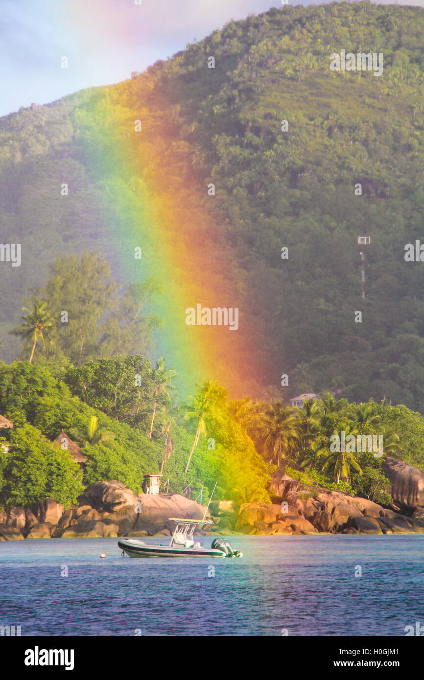 Big Rainbow over tropical island and luxurious hotel at Seychelles ...