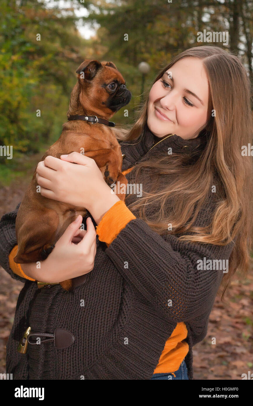 Happy girl with dog Stock Photo - Alamy