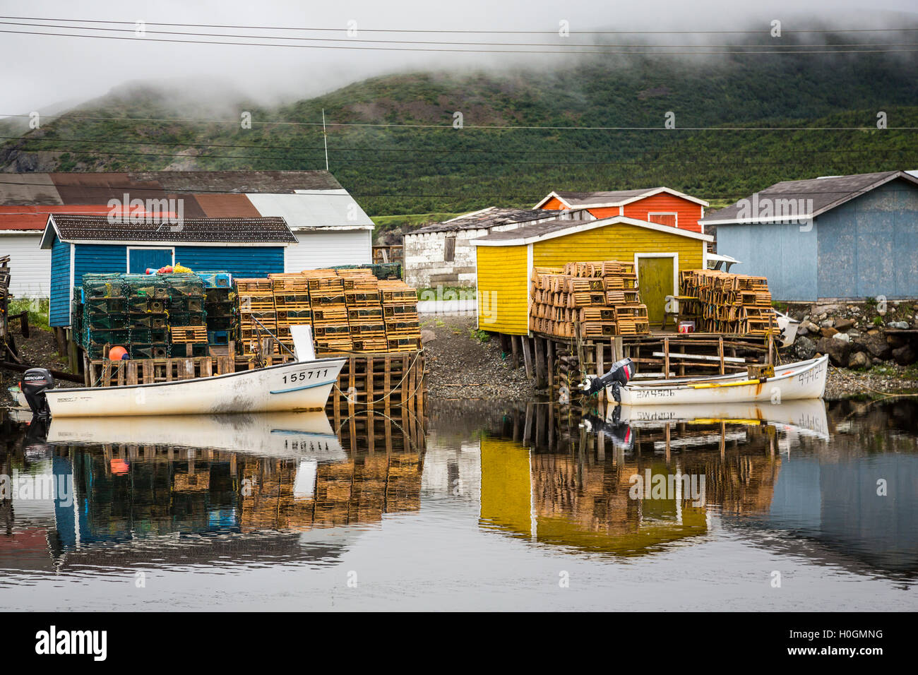 The fishing village and harbour with fishing stages and fishing boats ...