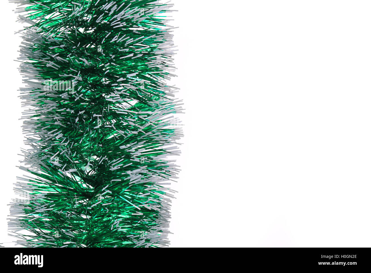 Christmas green tinsel Stock Photo - Alamy