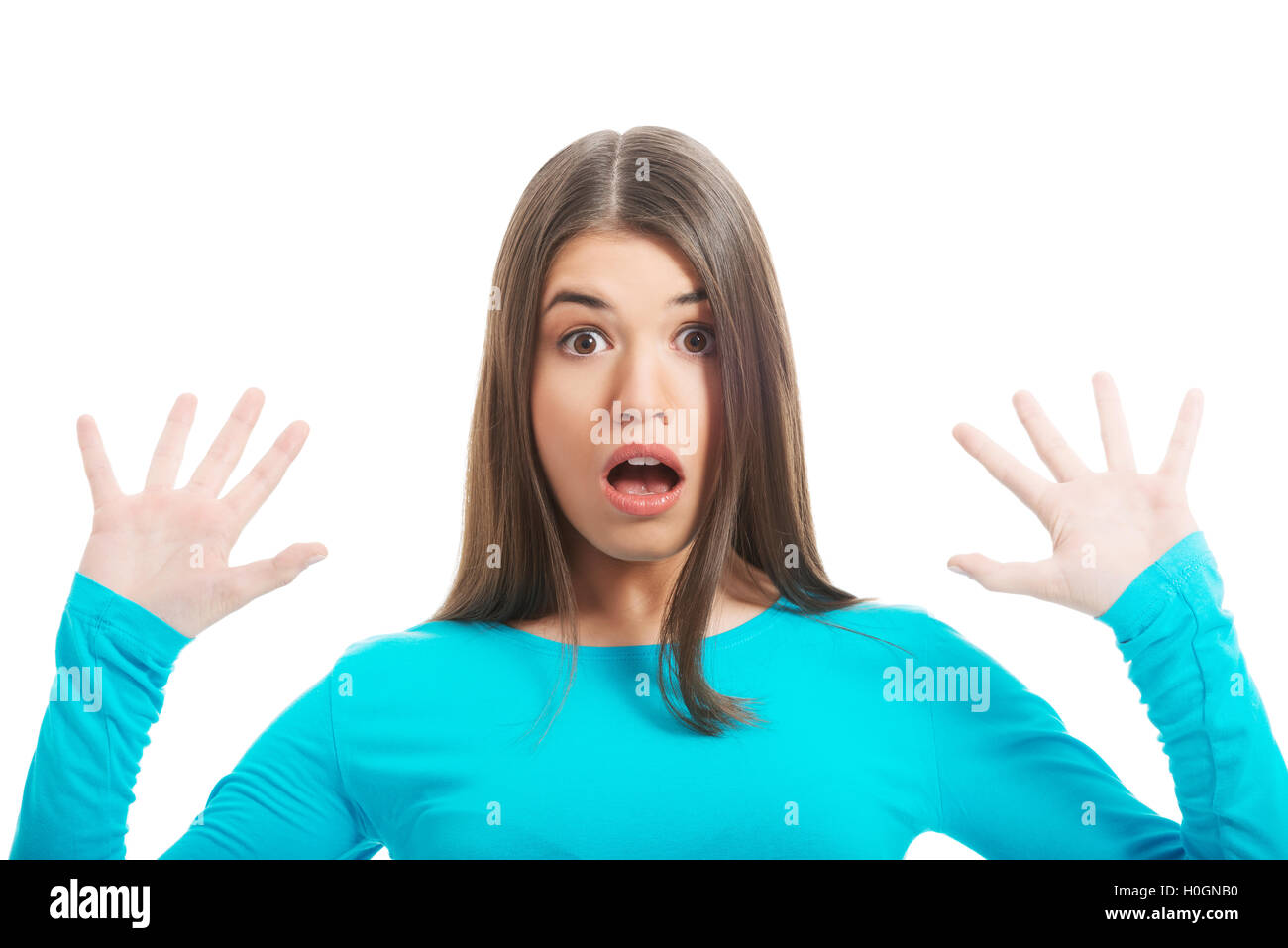 Young casual woman with open palms Stock Photo - Alamy
