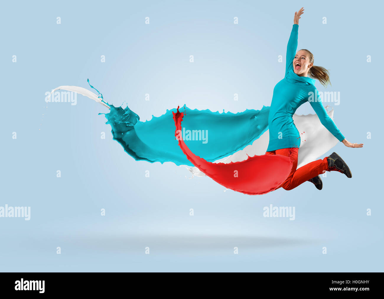 young female dancer jumping with splash of paint Stock Photo - Alamy
