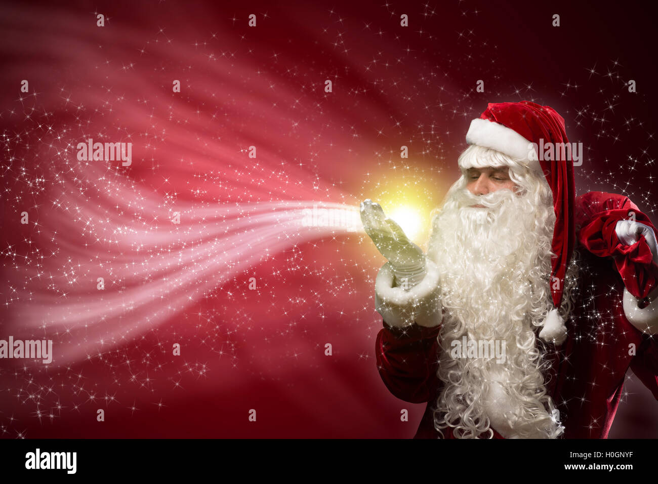 Santa Claus and the magic Stock Photo - Alamy