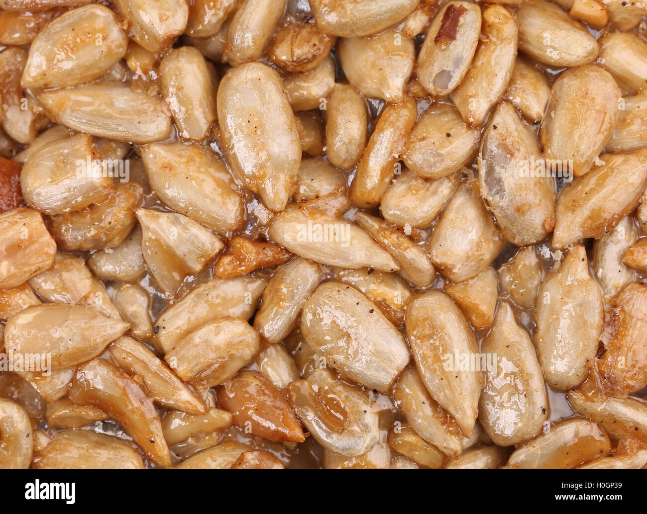 Background of roasted nuts with sugar Stock Photo - Alamy