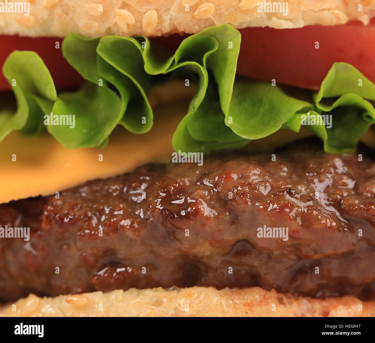 Big appetizing fast food hamburger Stock Photo - Alamy