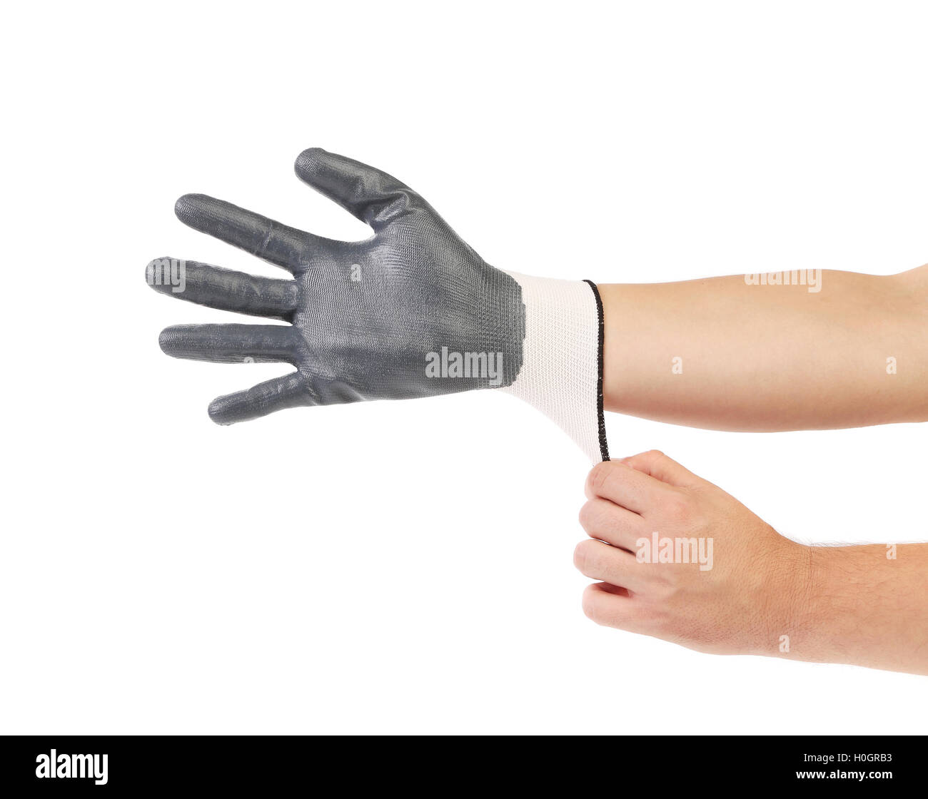 Hands putting on glove Stock Photo - Alamy