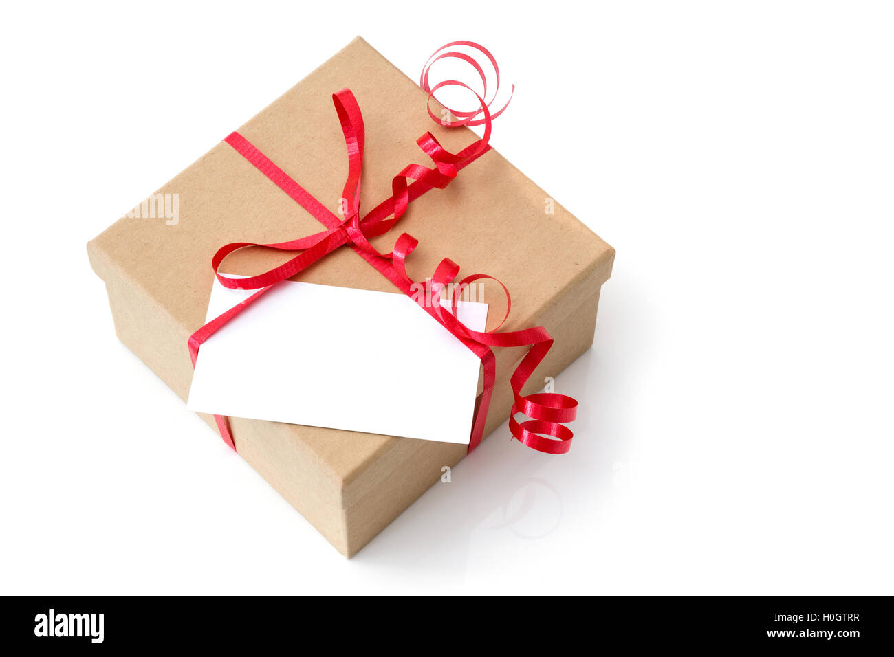 Gift tag yellow ribbon Cut Out Stock Images & Pictures - Alamy