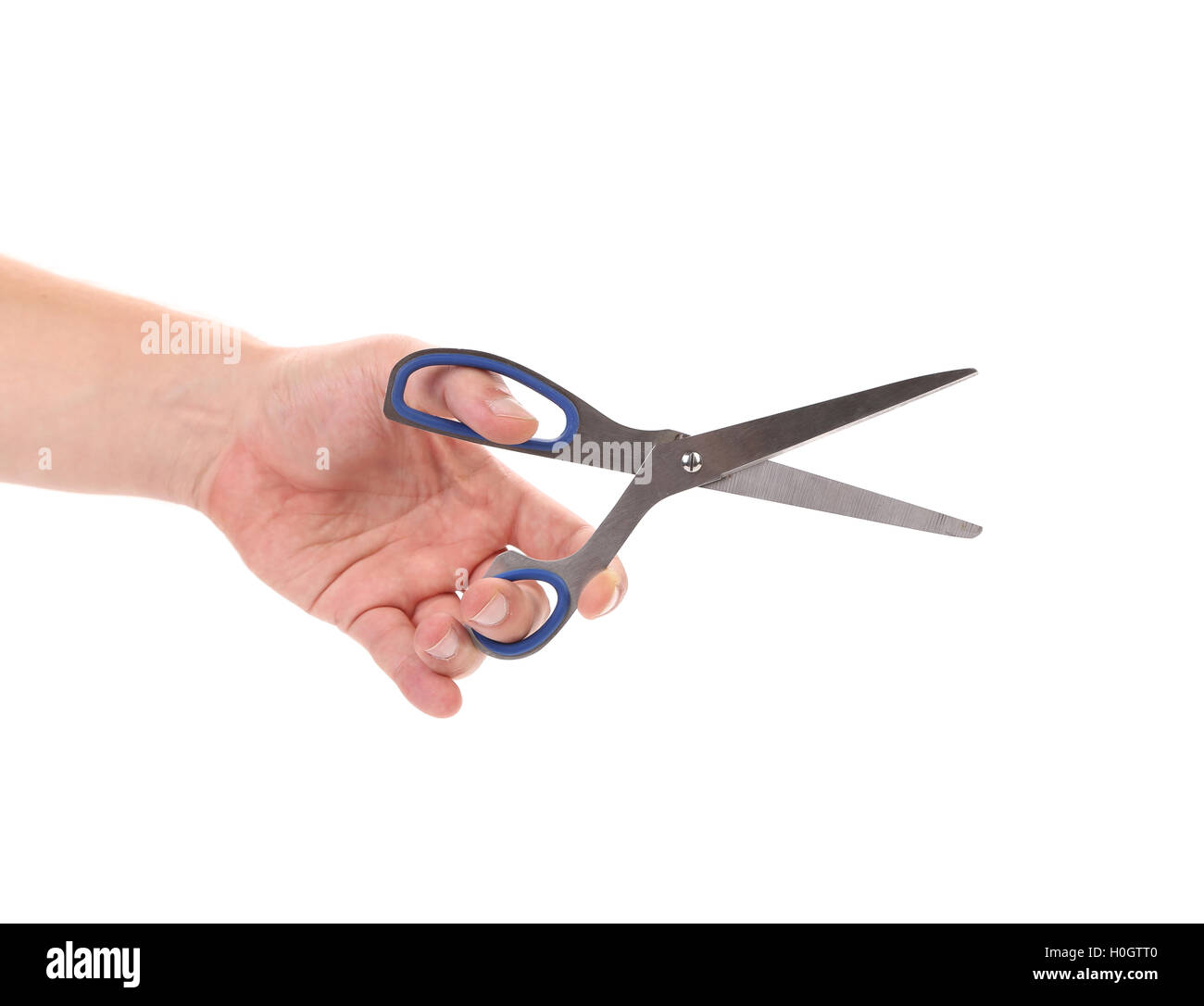 Male hand holding scissors Stock Photo - Alamy