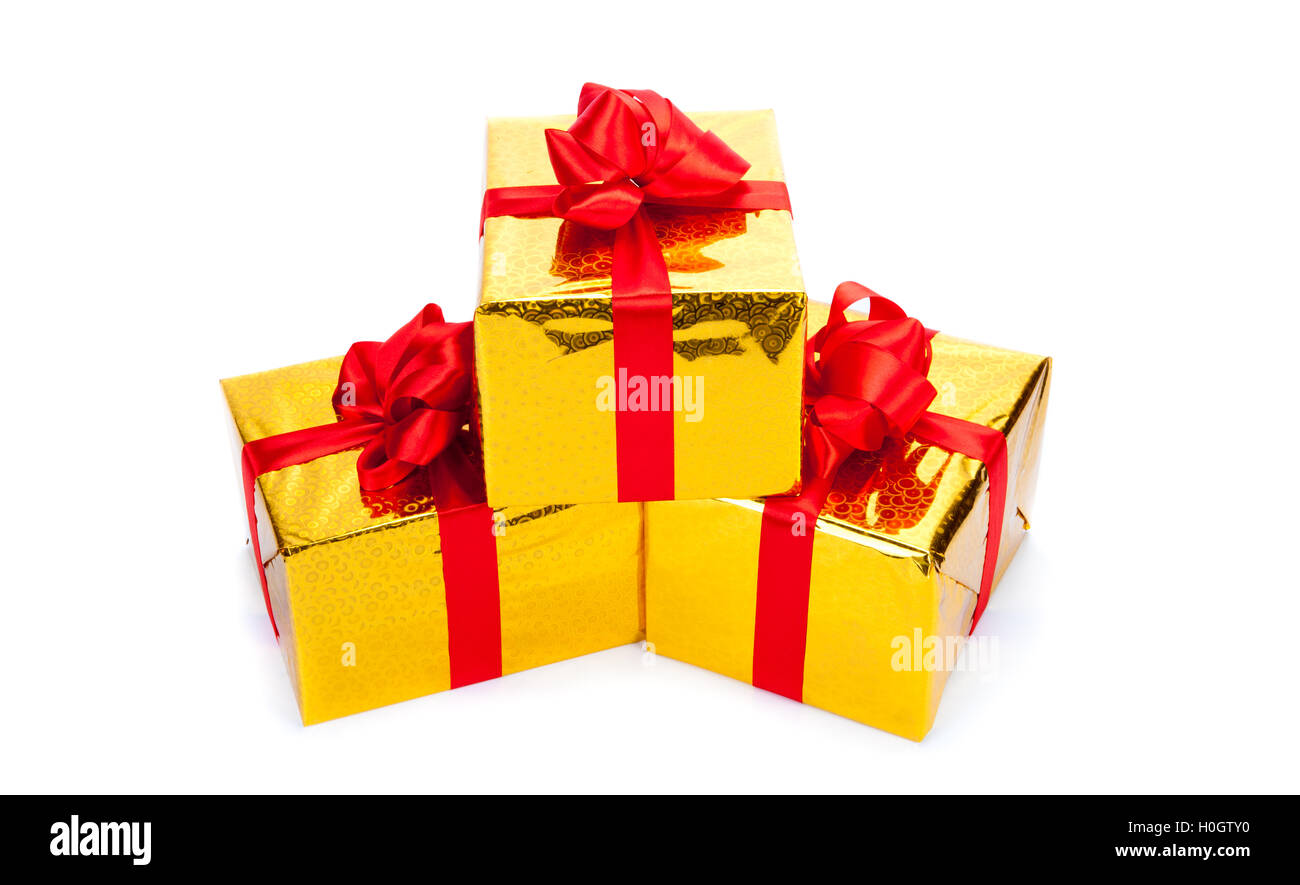 Three gold gift boxes Stock Photo - Alamy