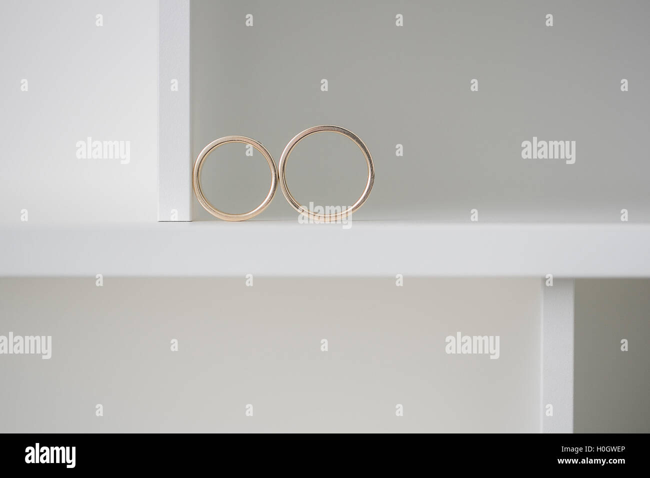 Two wedding rings on a white background.. Mr. and Mrs Stock Photo - Alamy