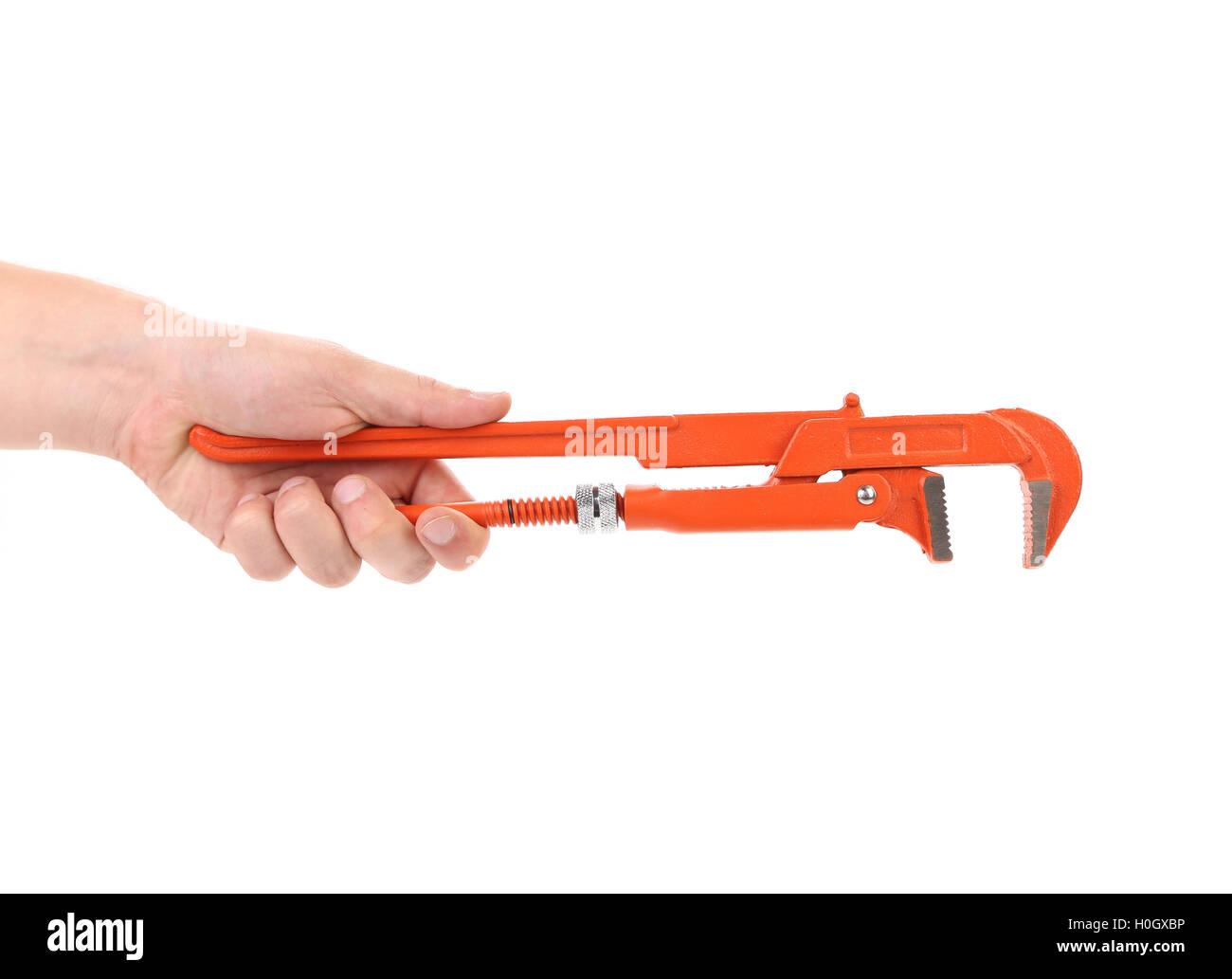 Hand holding wrench Stock Photo - Alamy